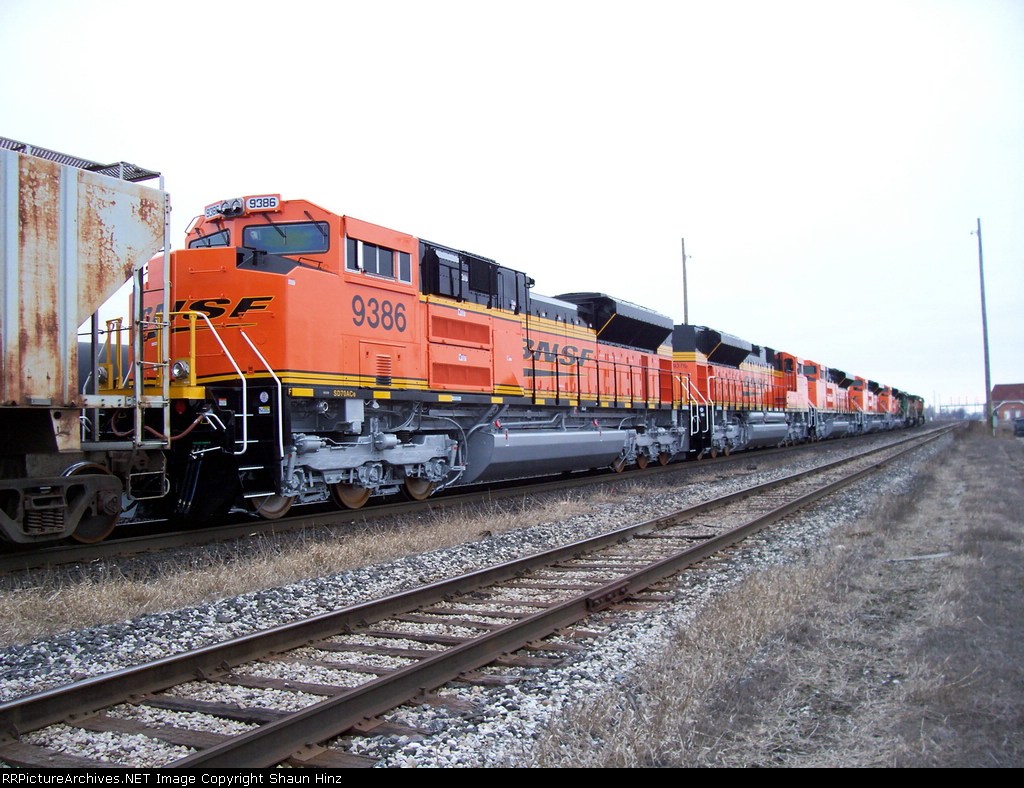 BNSF SD70ACe #9386 along with four other sister units is lead by two older BNSF units